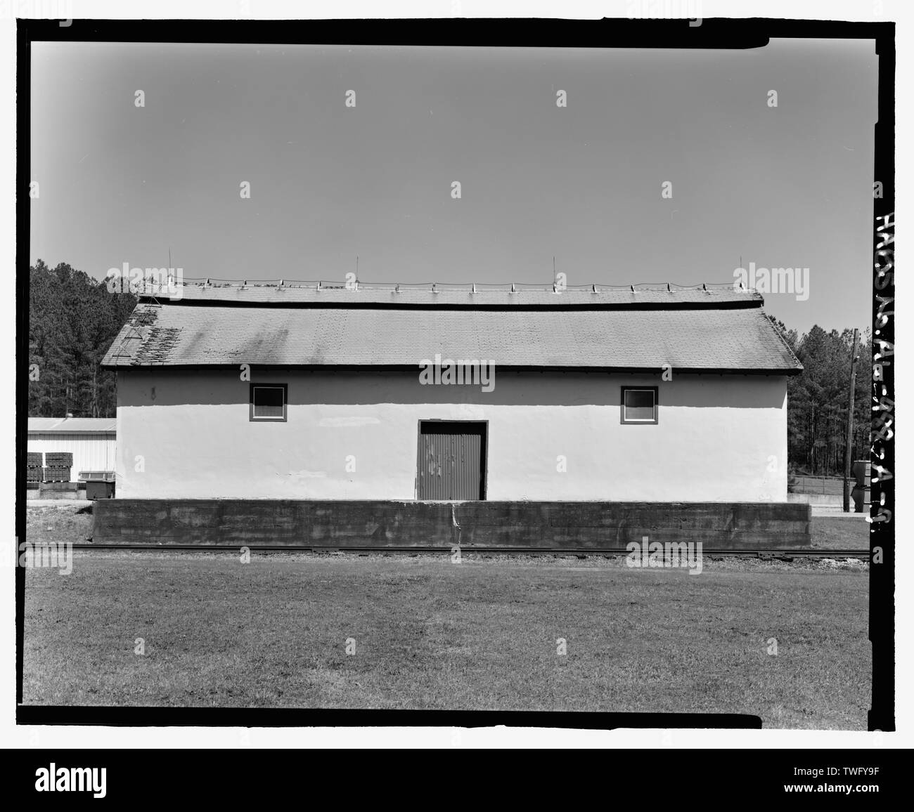 Planar view of rear (west) side, view towards the east northeast ...