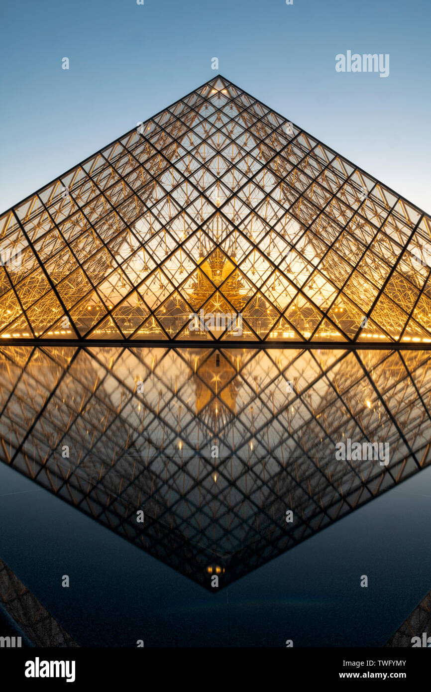 The Louvre Pyramid at night Stock Photo - Alamy
