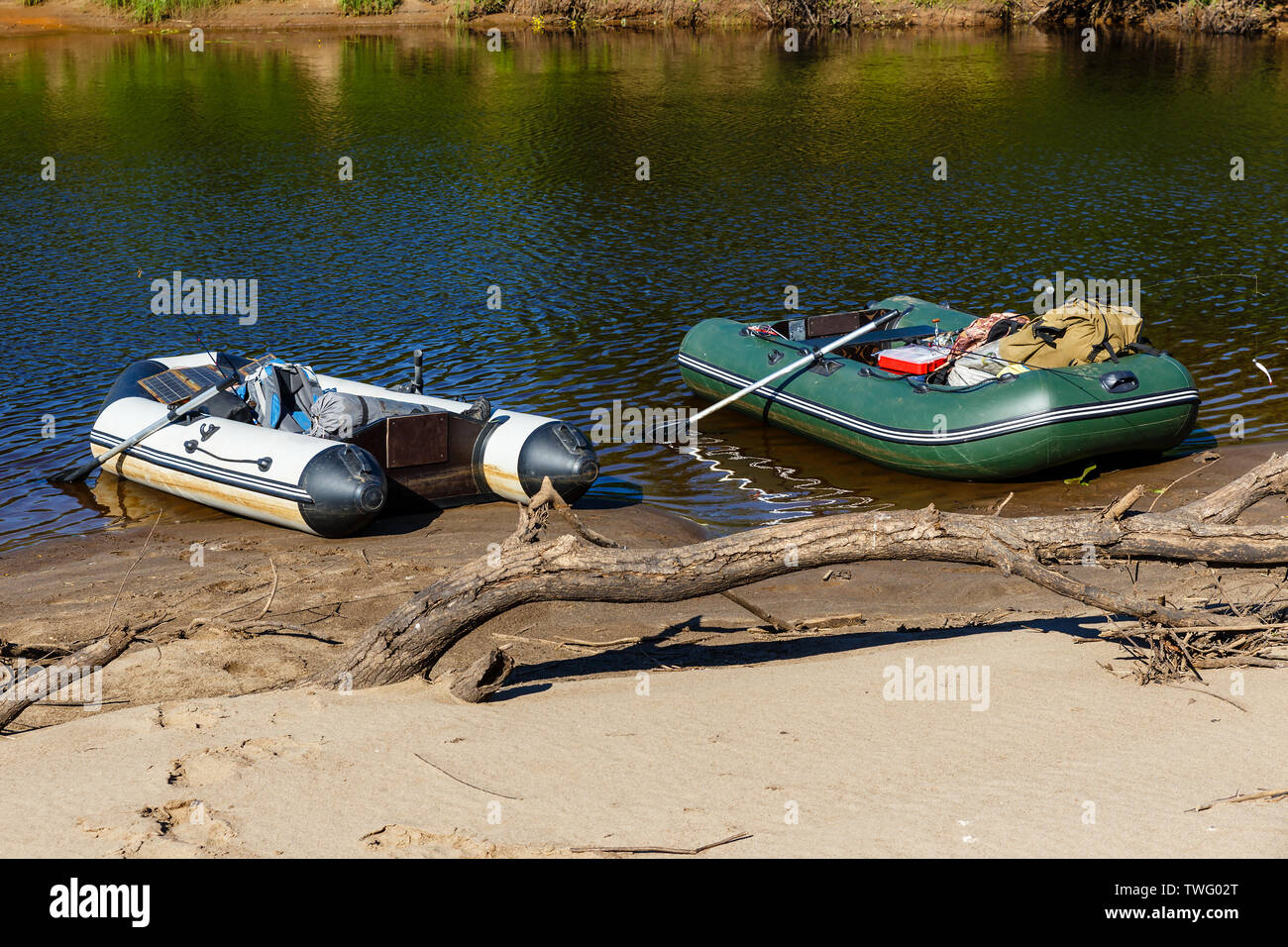 two rubber boats, rubber boats on coast river Stock Photo - Alamy