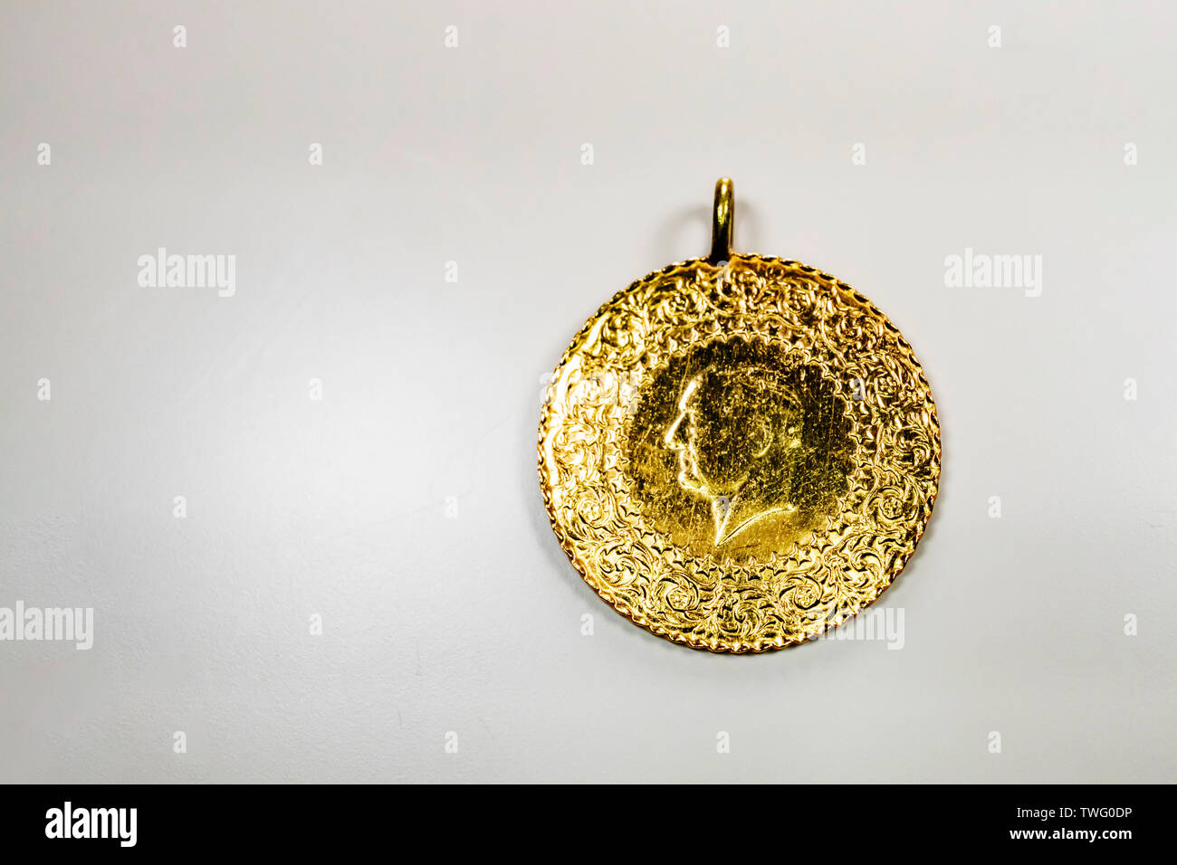 close up half Turkish gold lira on the white background Stock Photo - Alamy