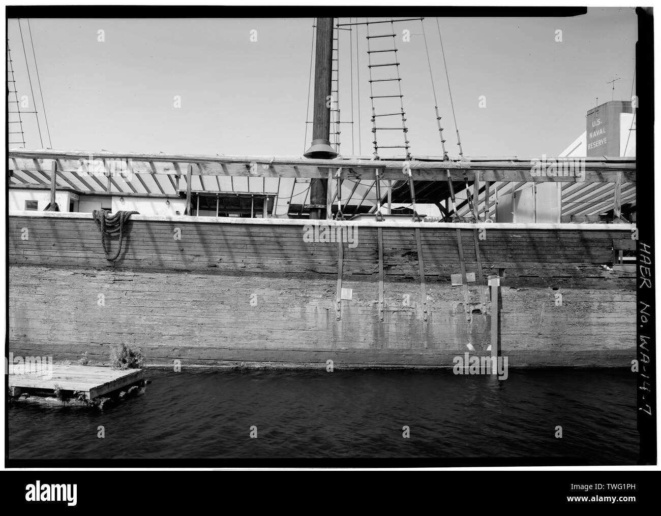 Port side of hull at mainmast showing chainplates, scuppers, bulwark ...