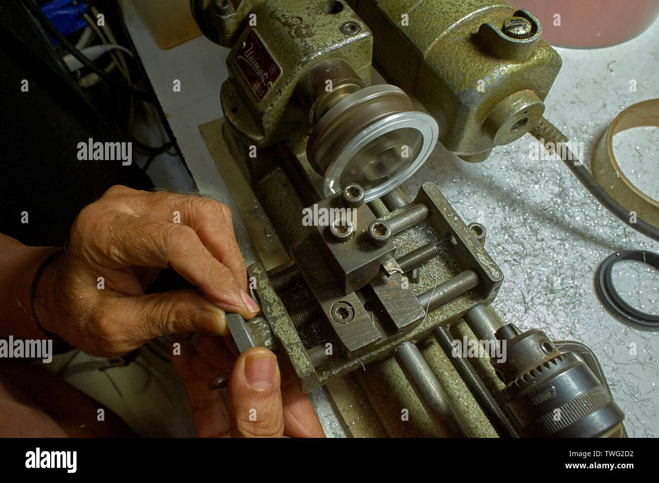 man working on Mini Lathe machine, Mumbai India, Asia Stock Photo - Alamy
