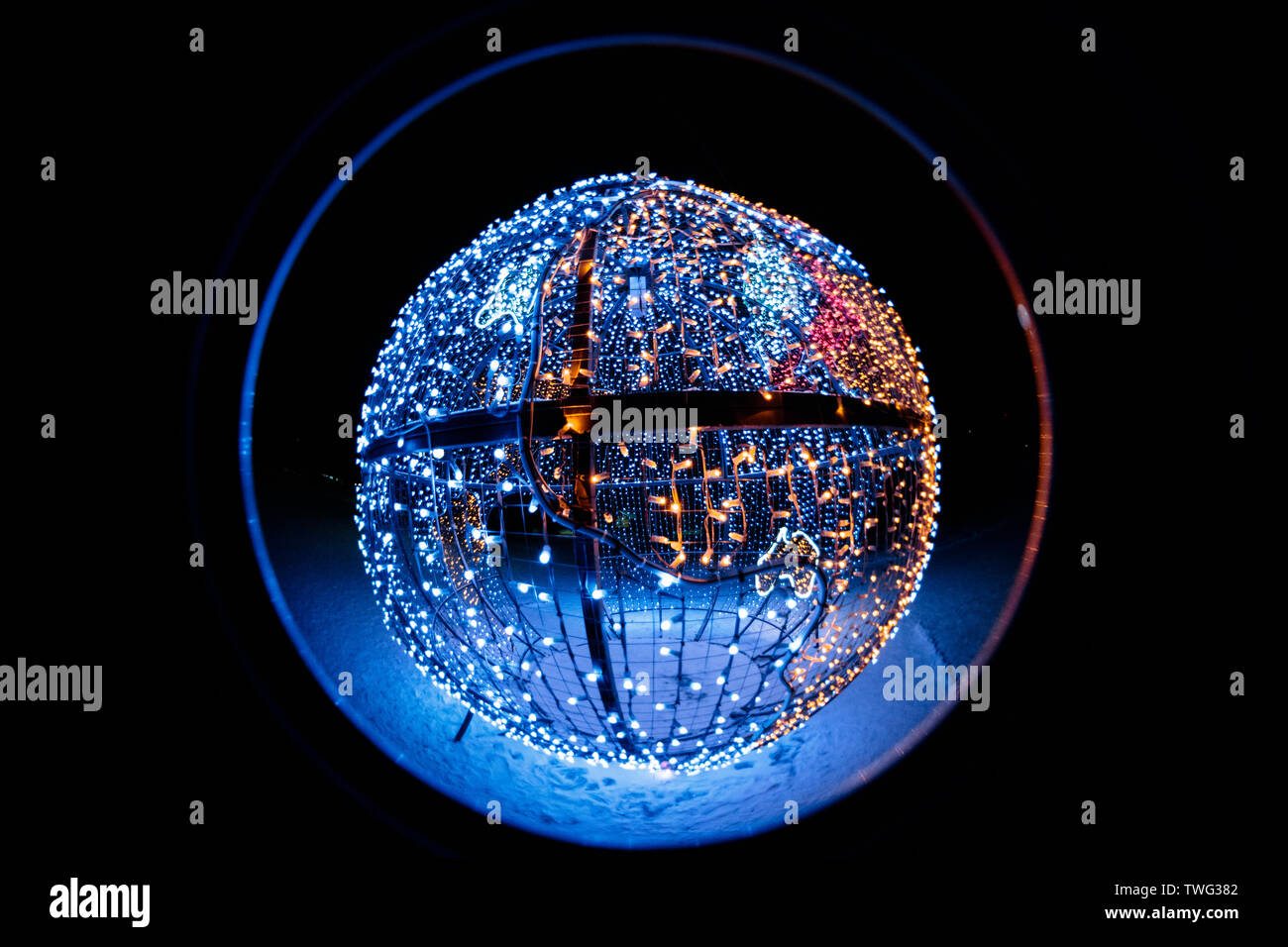 Christmas illumination in the form of planet earth on the street in the ...