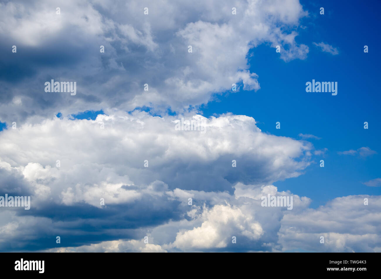 Blue sky background with gray clouds Stock Photo - Alamy