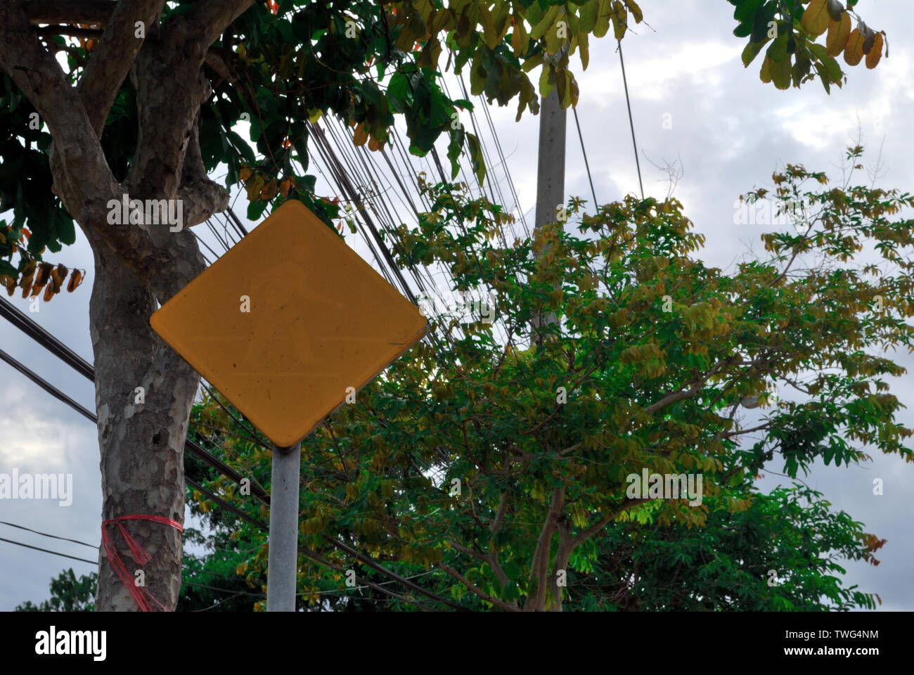 Traffic signs. Watch out for people walking across faded roads Stock ...