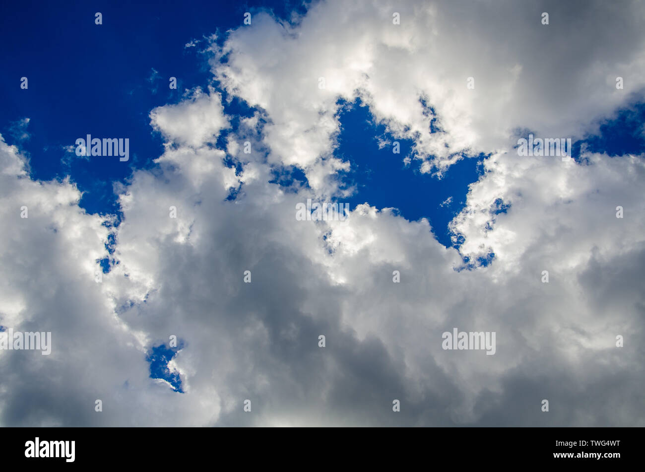 Blue sky background with gray clouds Stock Photo - Alamy