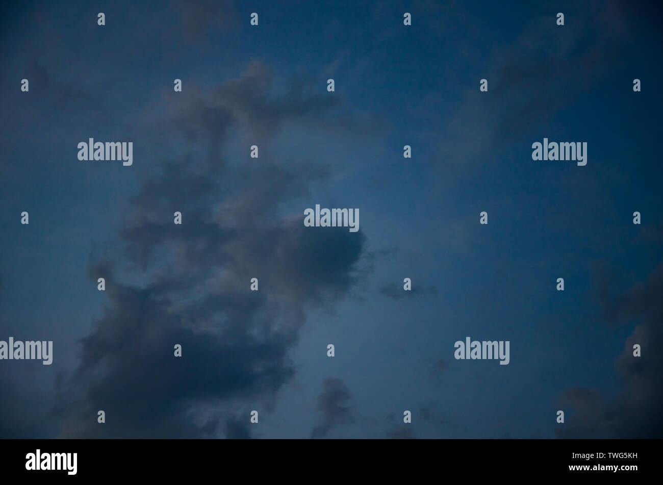 Night sky with cumulus clouds in moon rays Stock Photo - Alamy