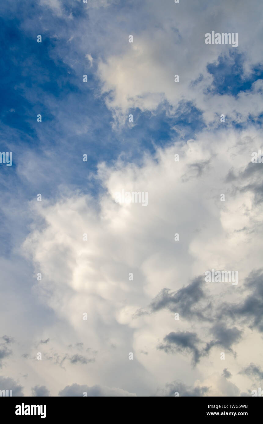 Blue sky background with gray clouds Stock Photo - Alamy