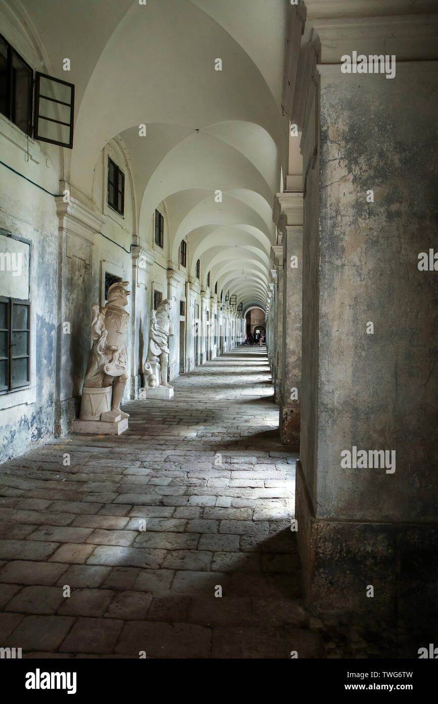 The lonely and empty corridors of the old historical building with its ...