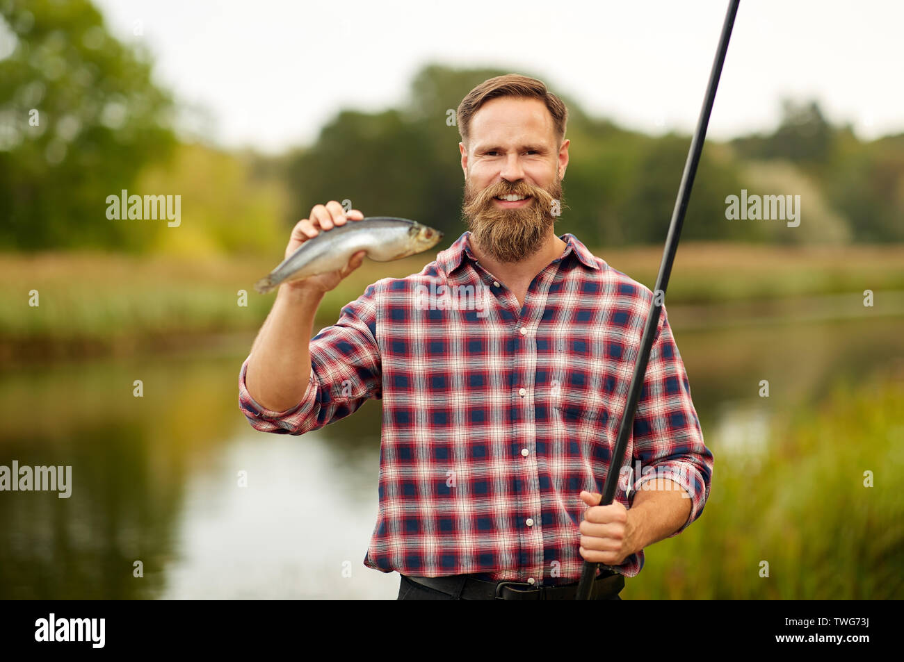 Rod with fish hi-res stock photography and images - Alamy
