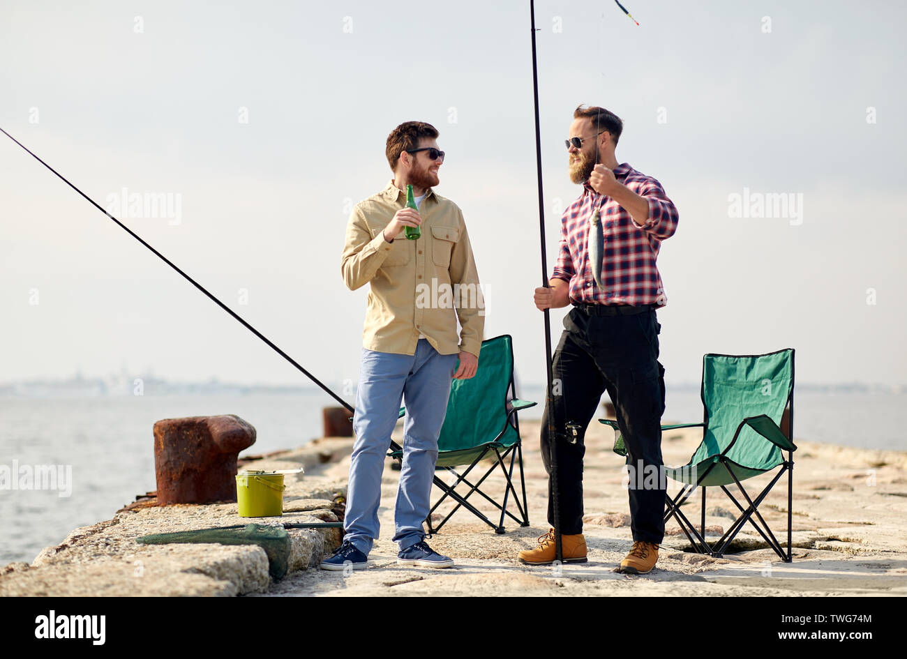 Happy fisherman fishing rod hi-res stock photography and images - Alamy
