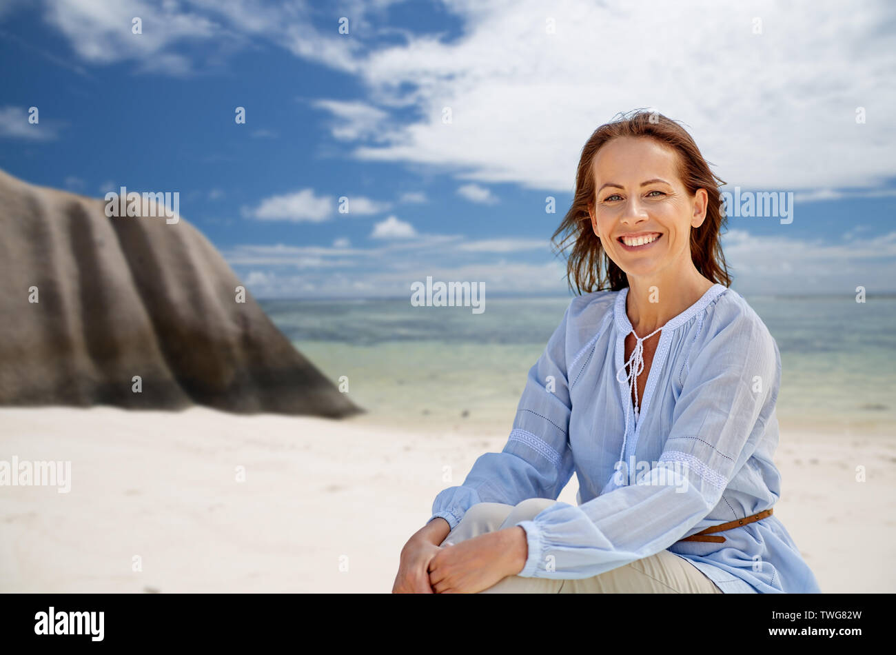 happy woman over seychelles island tropical beach Stock Photo - Alamy