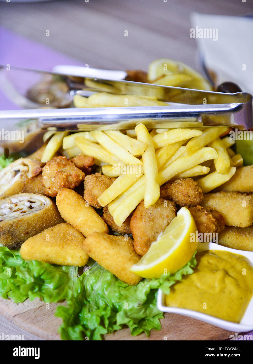delicious catering food set on wooden platter, image Stock Photo - Alamy