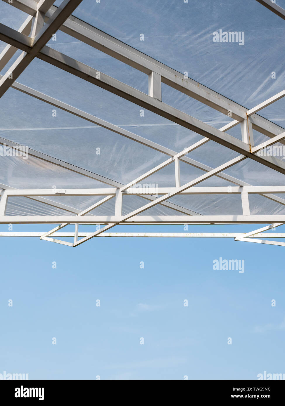 Metal frame of the modern canopy in the factory which under the clear ...