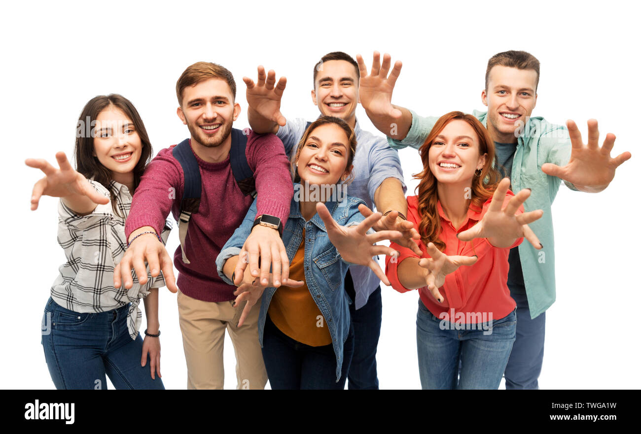 group of happy students over white background Stock Photo - Alamy