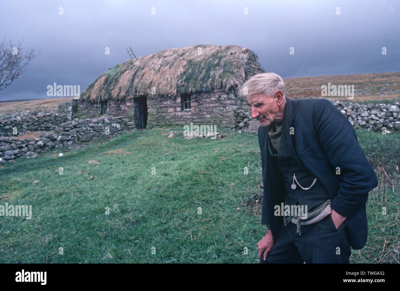Crofter Duncan McKenzie outside his thatched croft on the Applecrss ...
