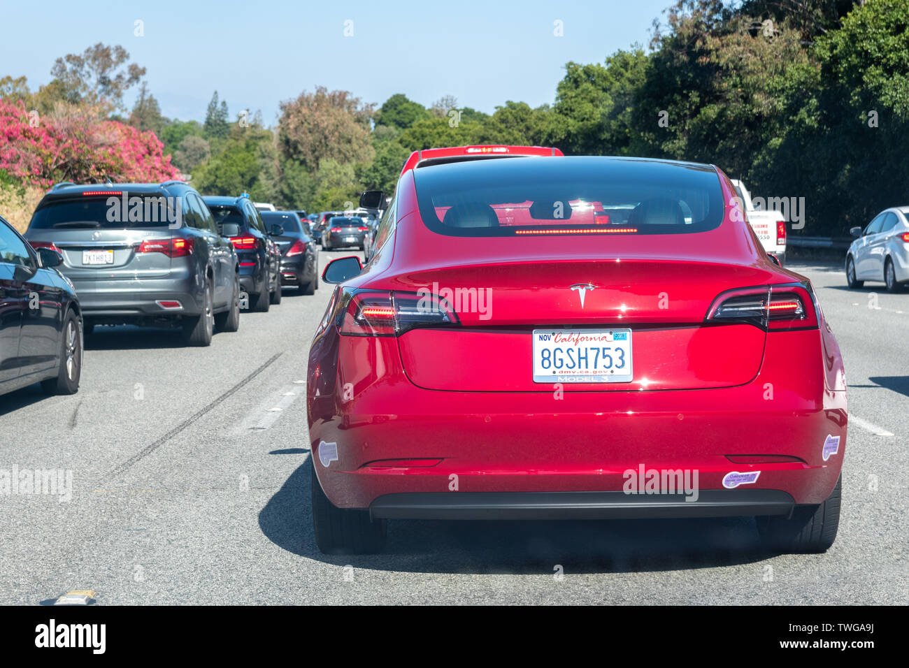 June 14, 2019 Los Altos Hills / CA / USA - Model 3 Tesla slowly ...