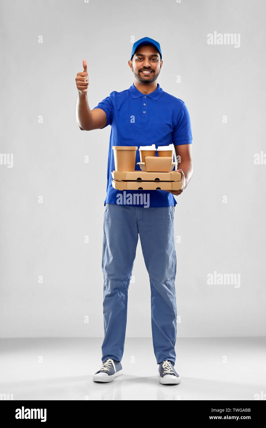 delivery man with food showing thumbs up Stock Photo - Alamy