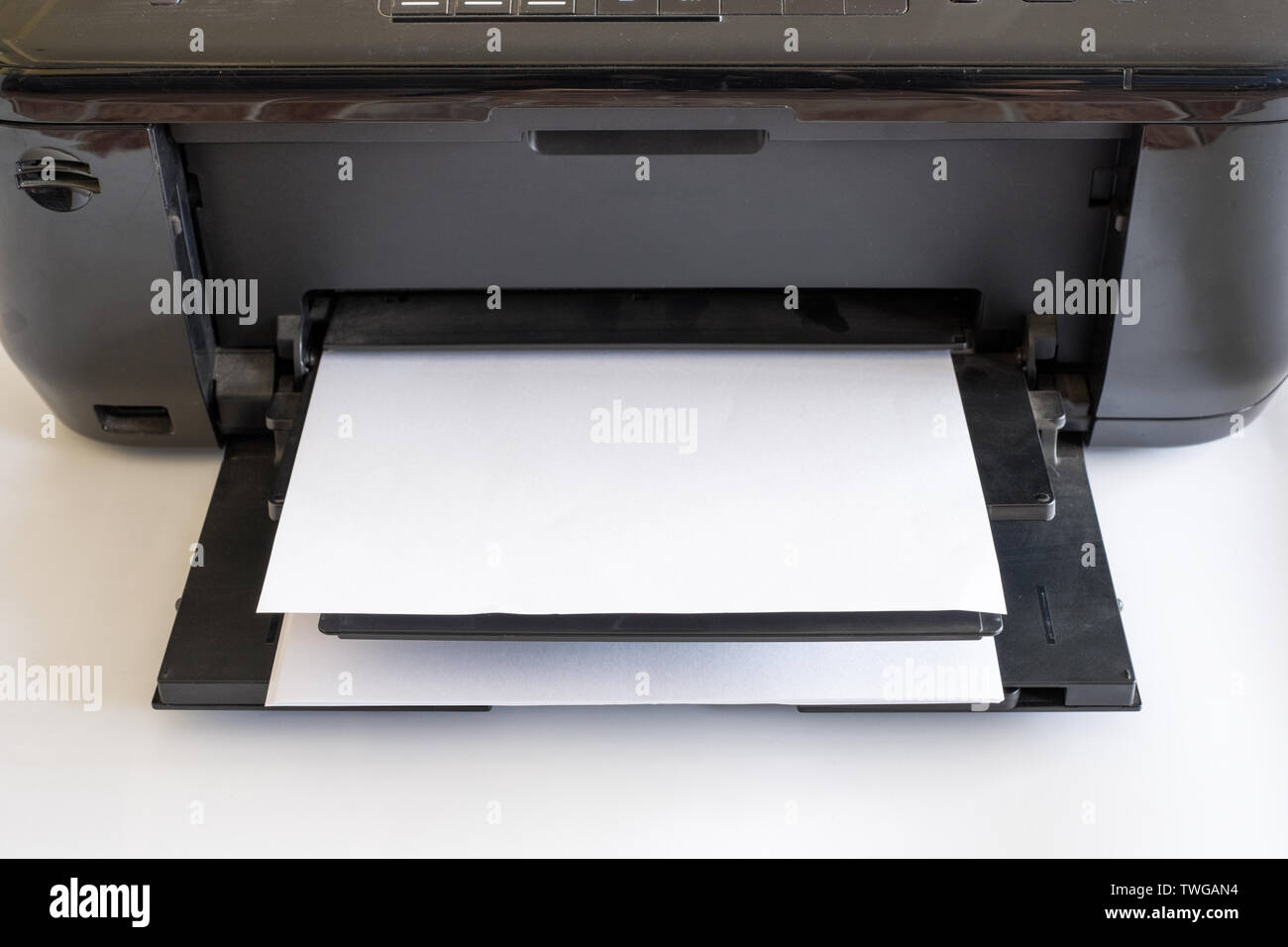 White paper in black printer toner and colors Stock Photo - Alamy