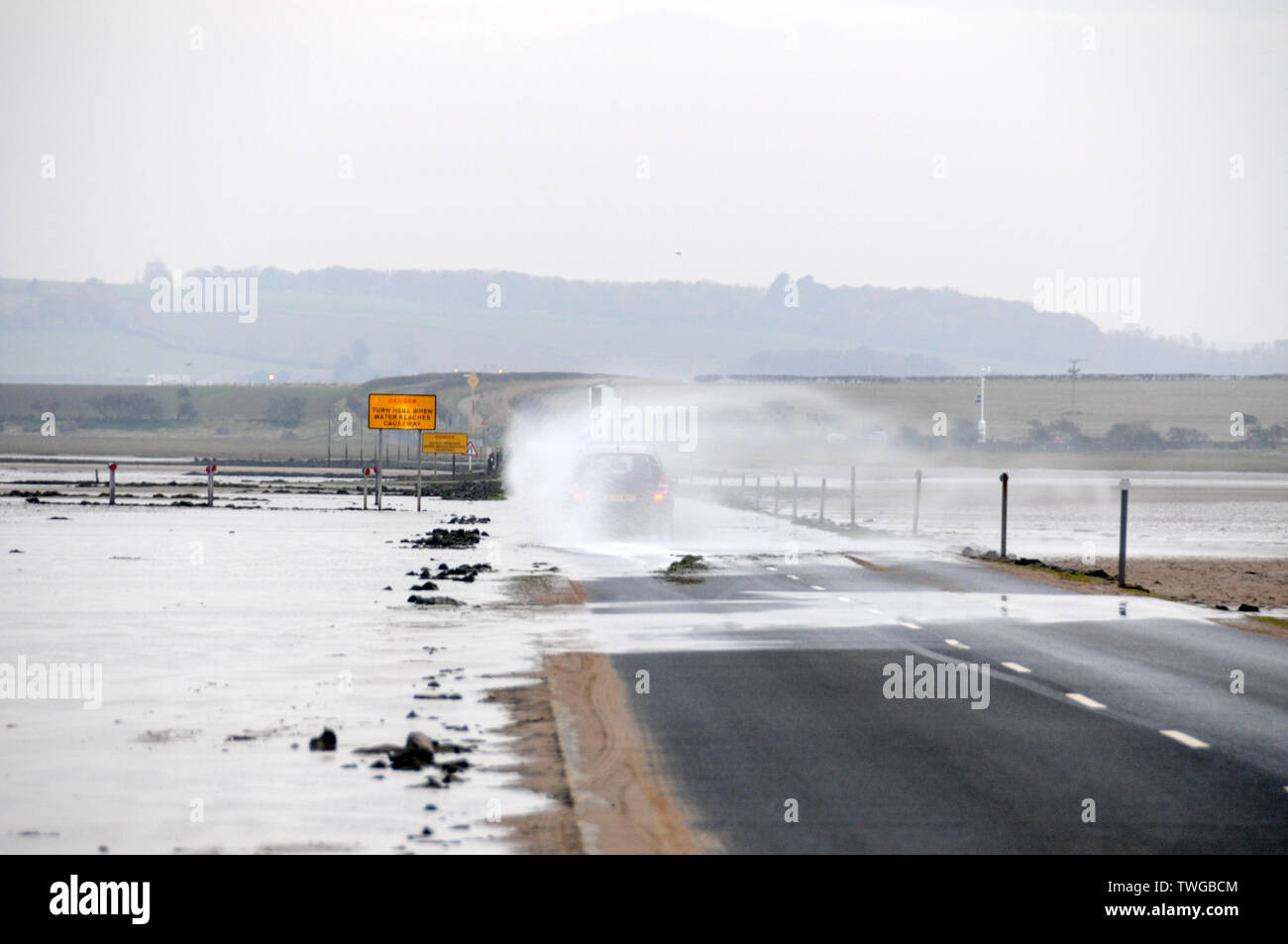 Lindisfarne causeway low tide hi-res stock photography and images - Alamy