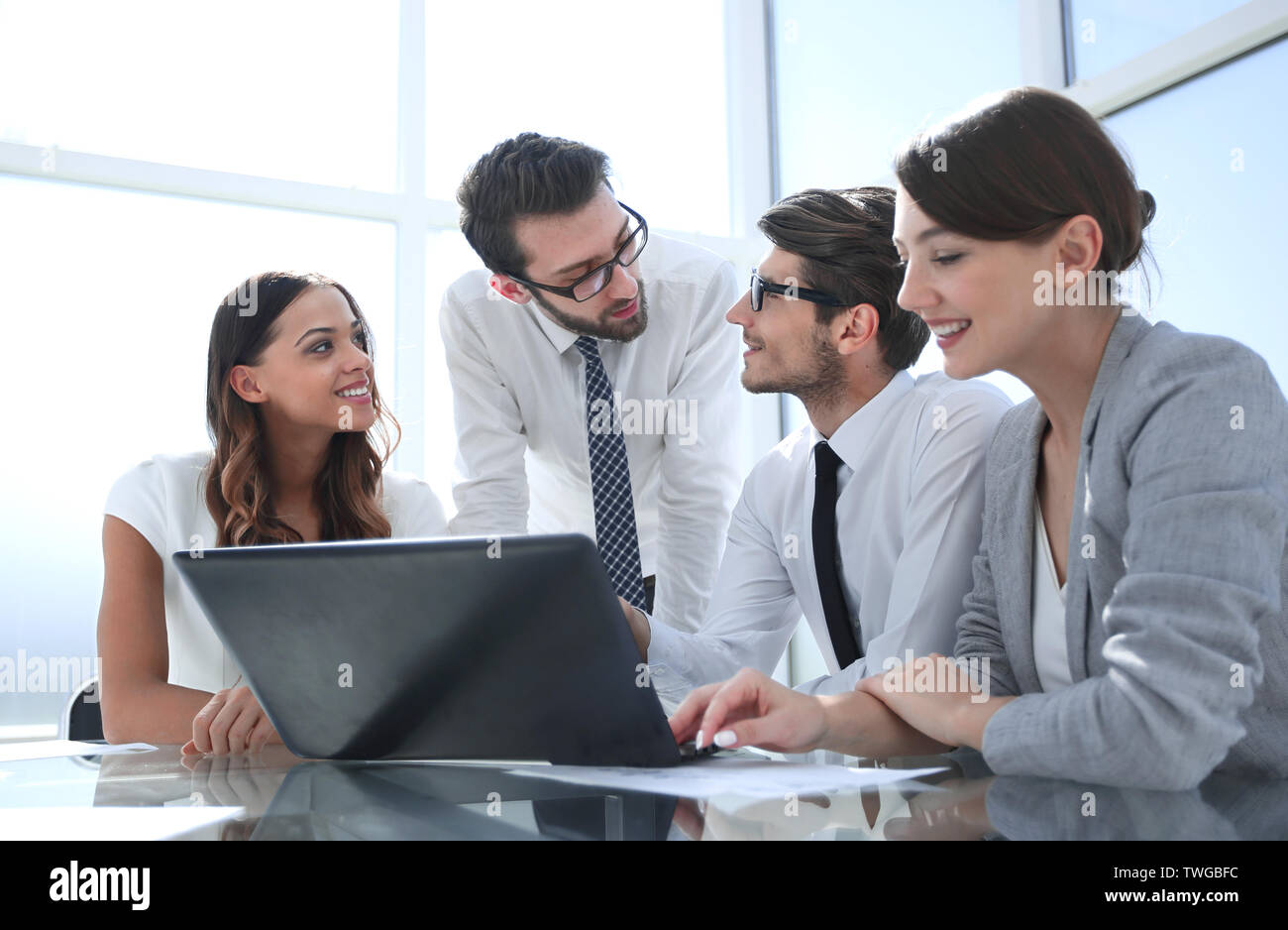 successful business team in the workplace in the office Stock Photo - Alamy