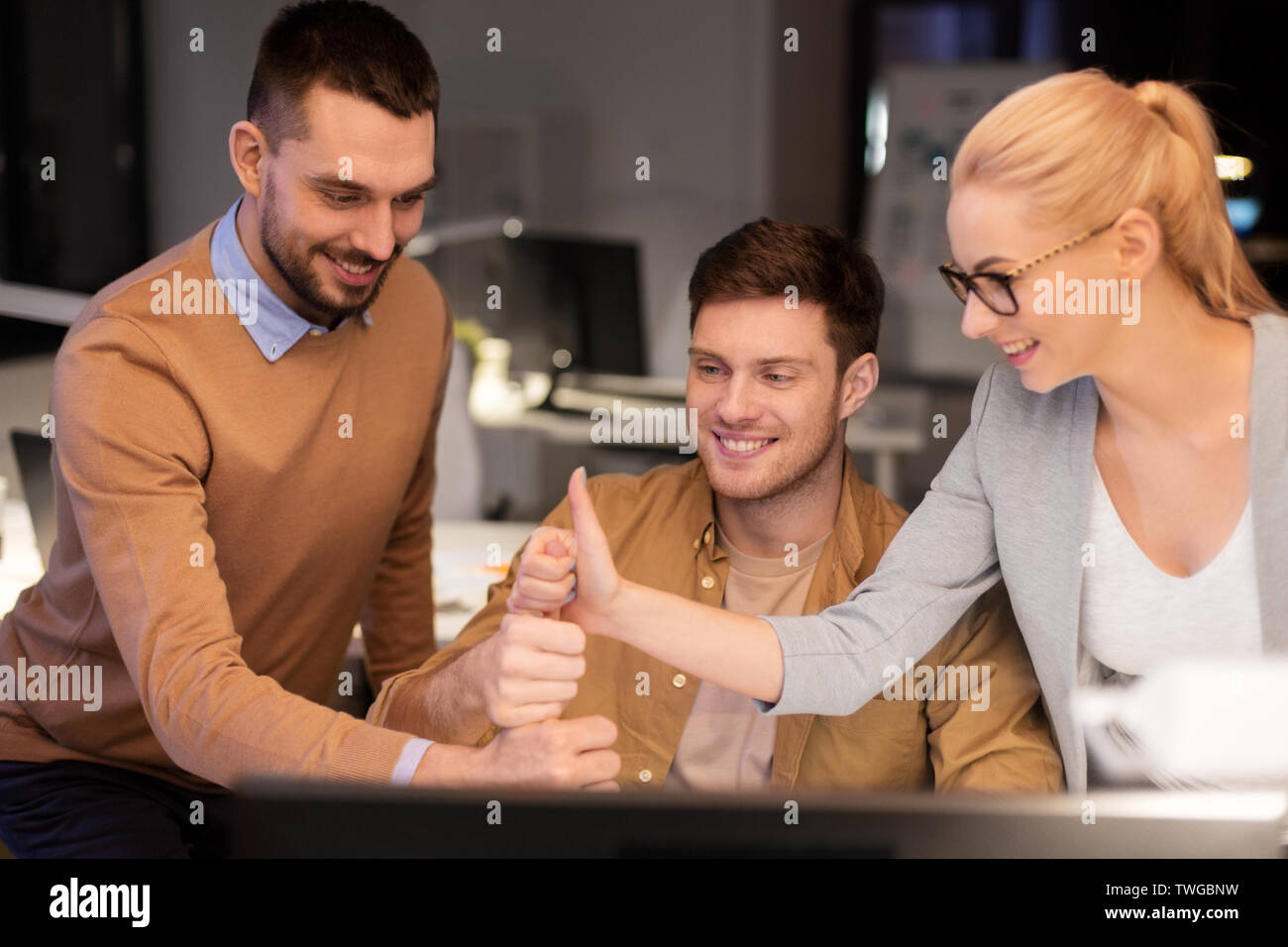 Businessman making thumbs up working hi-res stock photography and ...