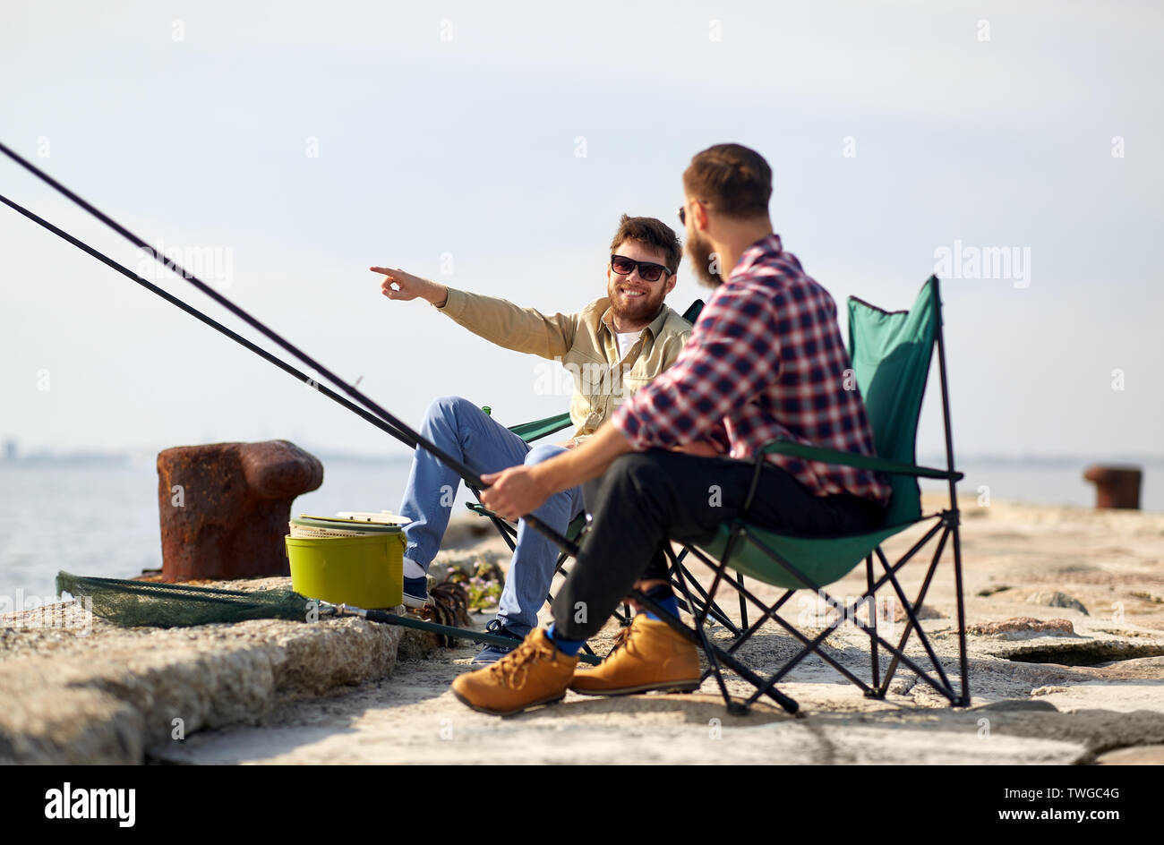 Young man pointing fish hi-res stock photography and images - Alamy
