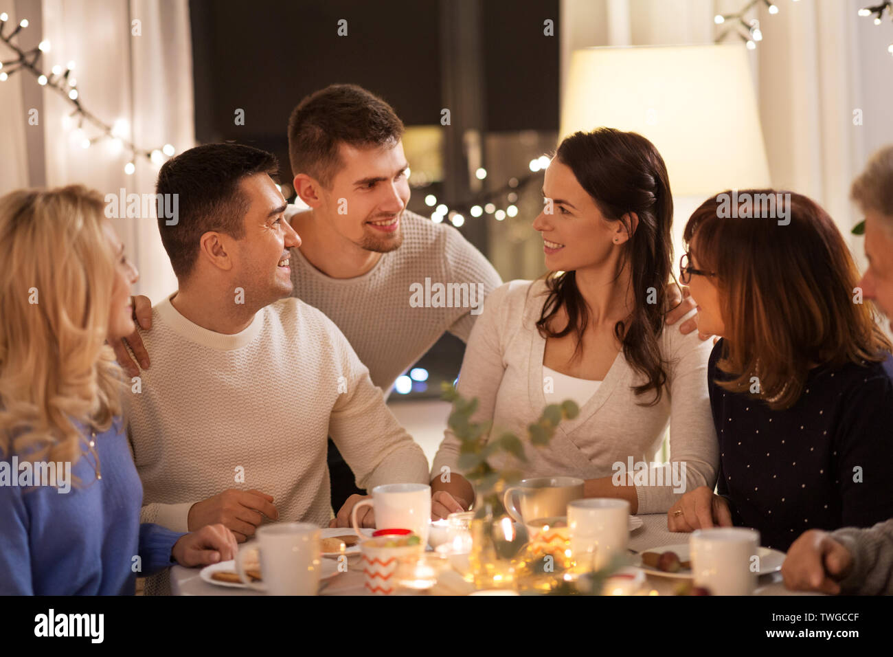 happy family having tea party at home Stock Photo - Alamy