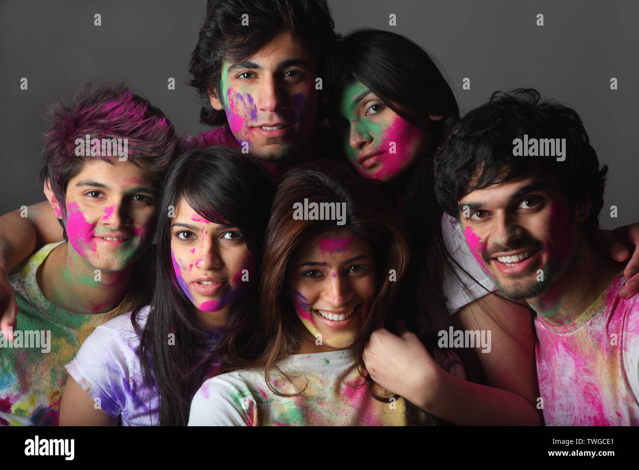 Group of friends celebrating holi festival Stock Photo - Alamy