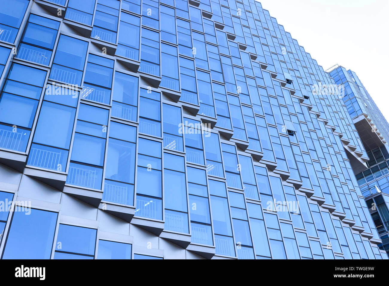 Modern architecture blue glass curtain wall Stock Photo - Alamy