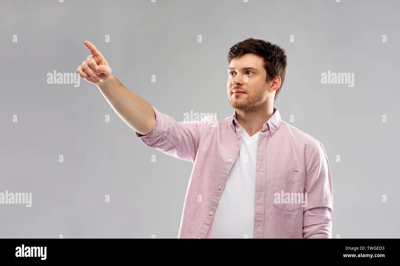 Man showing something hi-res stock photography and images - Alamy