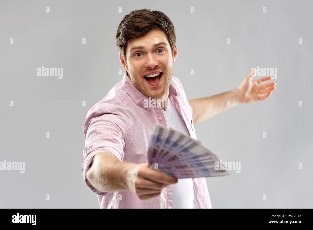 Fan of money and man hi-res stock photography and images - Alamy