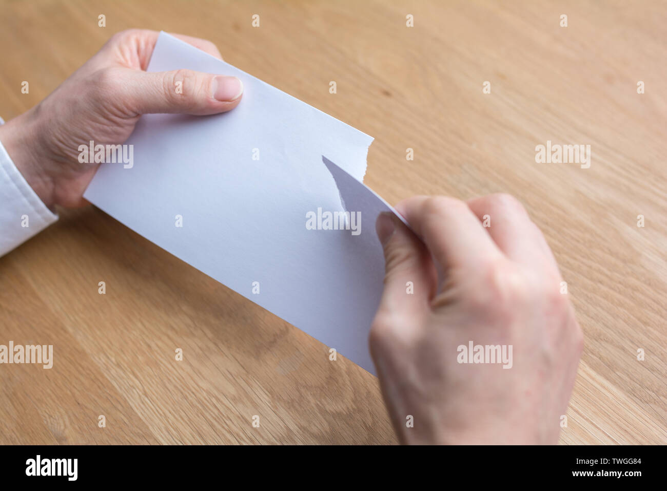 Tearing book hi-res stock photography and images - Alamy