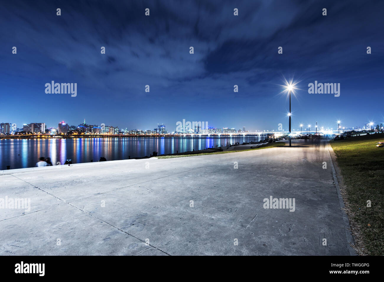 cityscape and skyline modern city at night from footpath Stock Photo ...