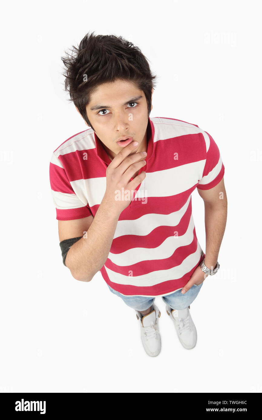 Portrait of a teenage boy thinking Stock Photo - Alamy