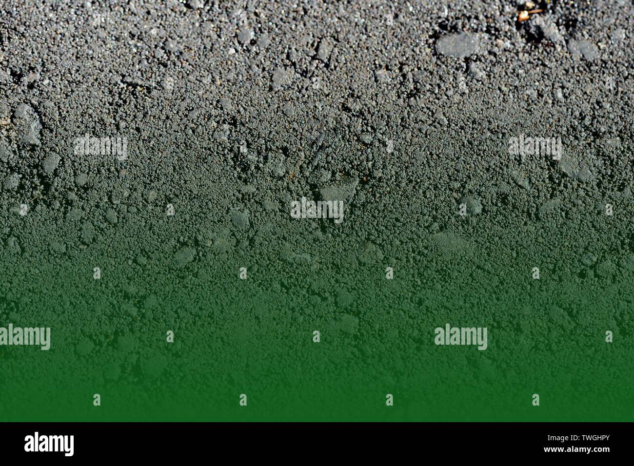Colored asphalt texture close up. Green gradient abstract background ...