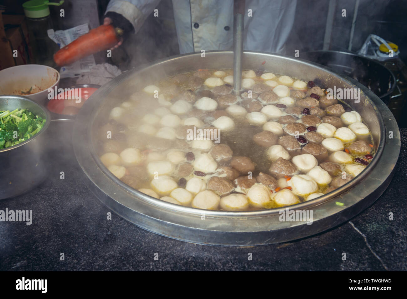 Food stand with boiled dumplings on Wangfujing food market in Beijing ...
