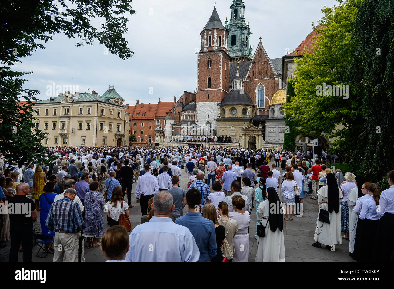 Believers take part in a mass before a religious procession marking the ...