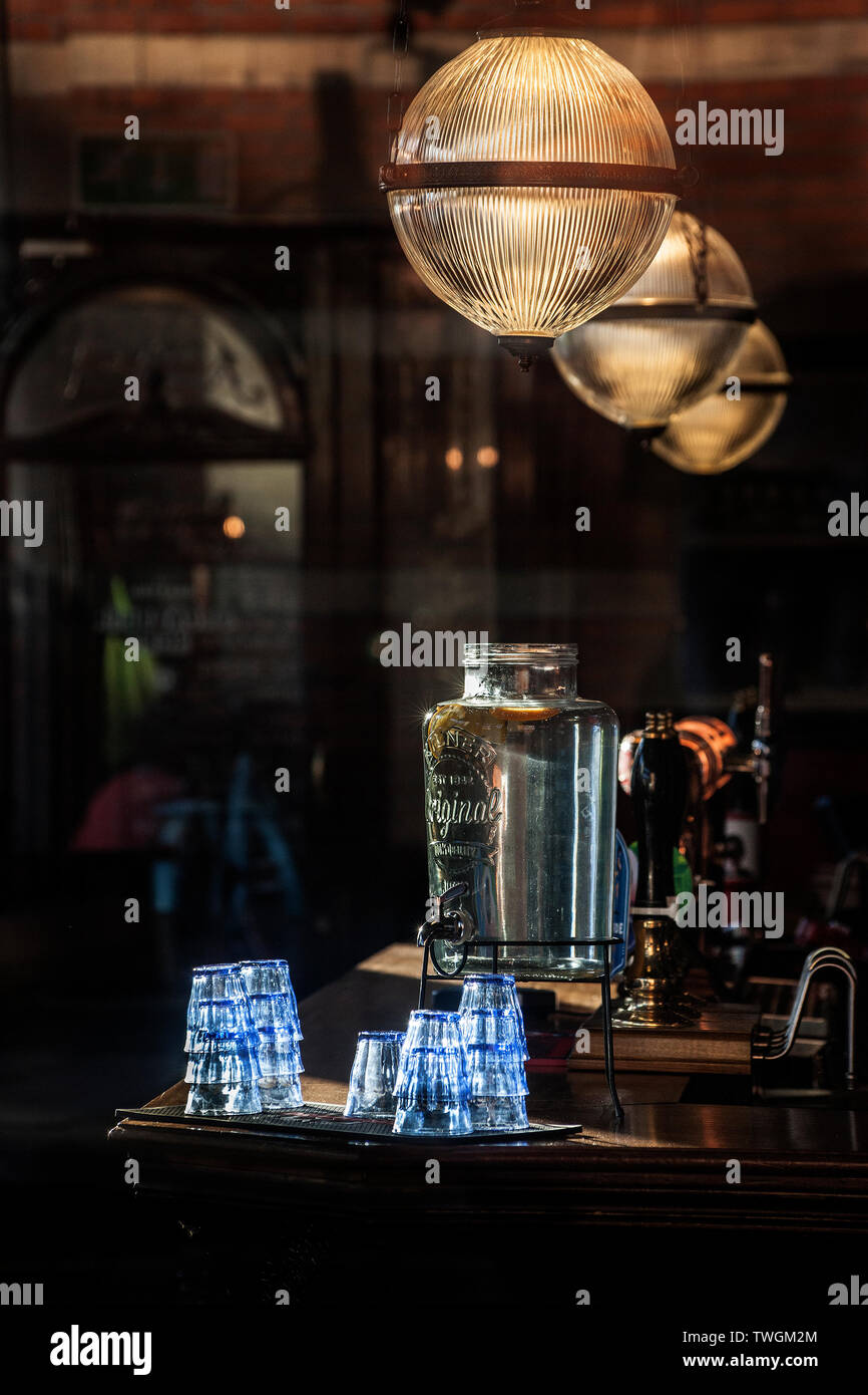 interior bar at the Grafton pub, kentish town, glasses and water ...