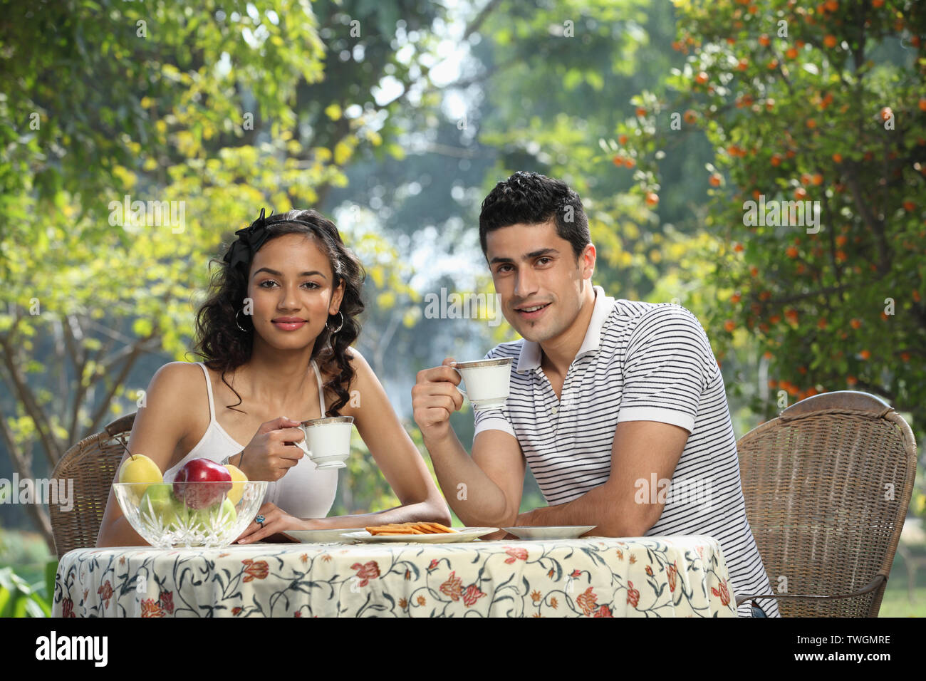 Couple drinking tea on garden hi-res stock photography and images - Alamy