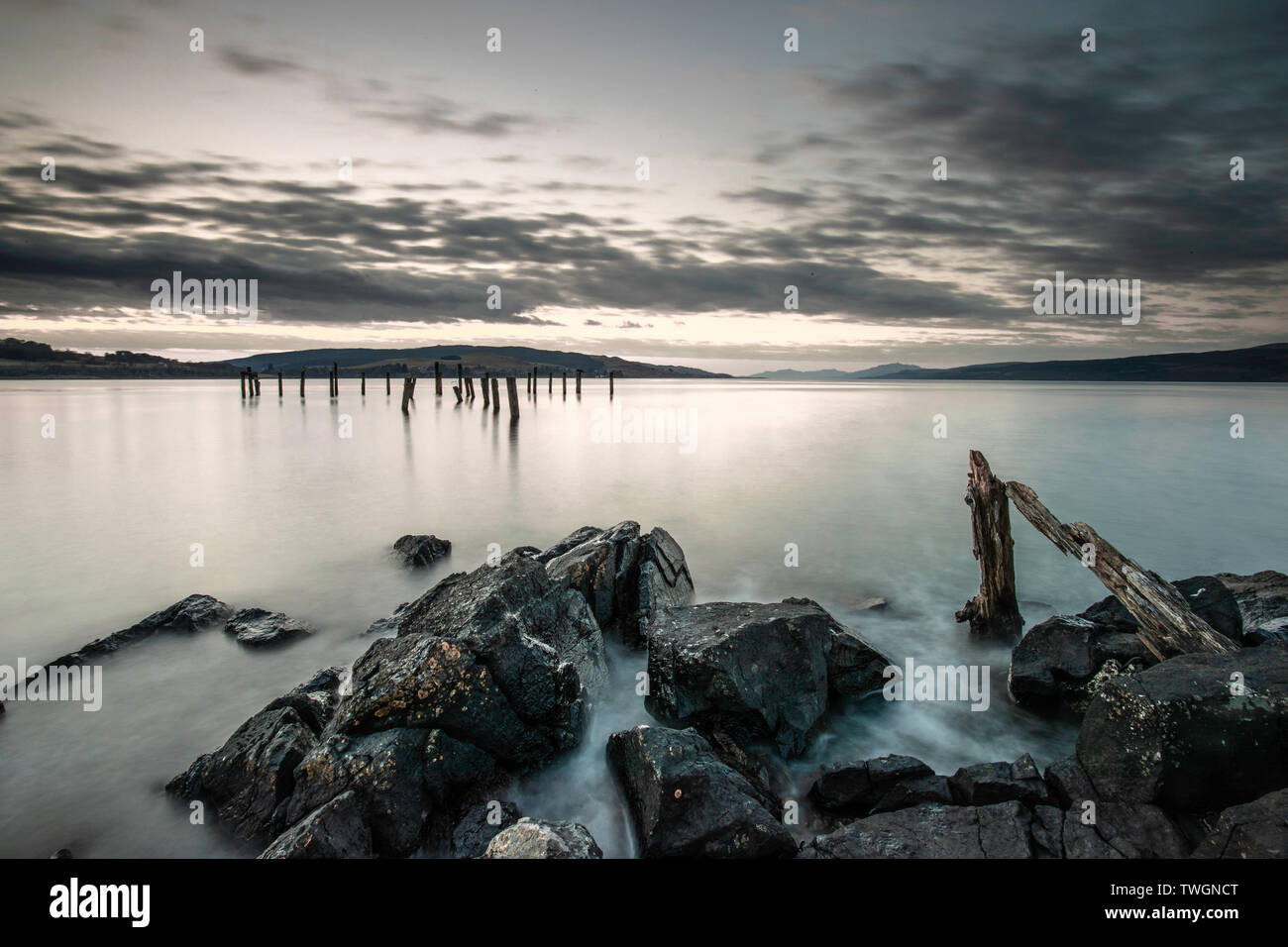 Sun setting over Salen Old Pier and the Sound of Mull, Isle of Mull ...
