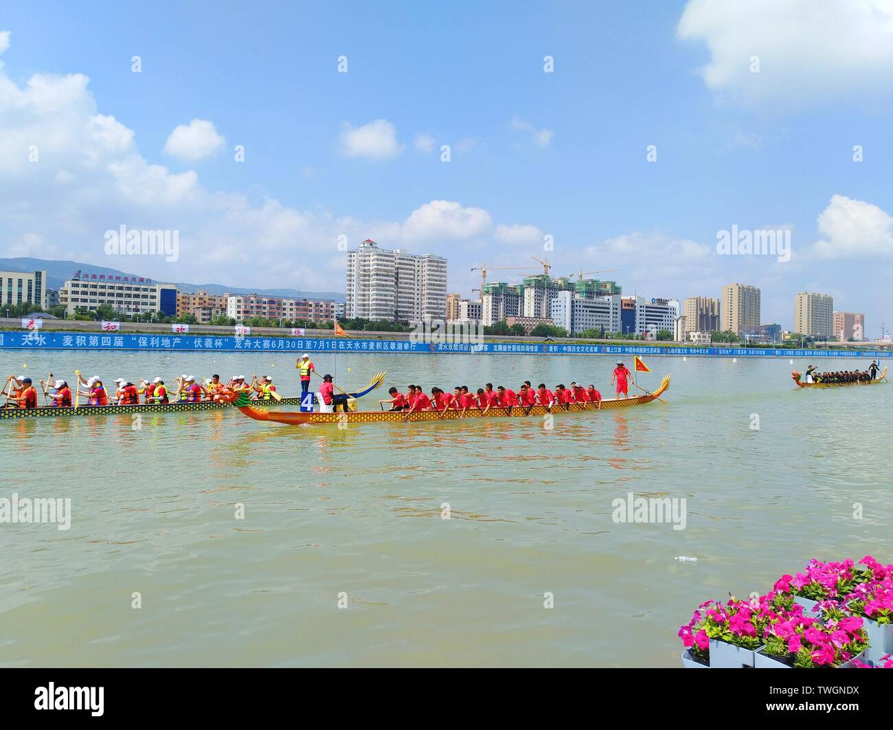 Dragon Boat race above Cuihu, China Dragon Boat Open Gansu Tianshui ...