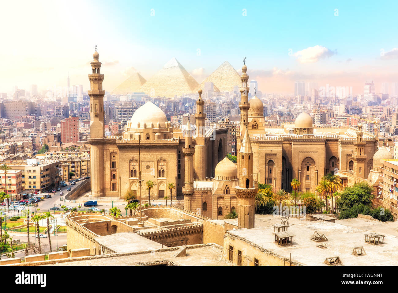 The Mosque-Madrassa of Sultan Hassan and the Pyramids on the background ...