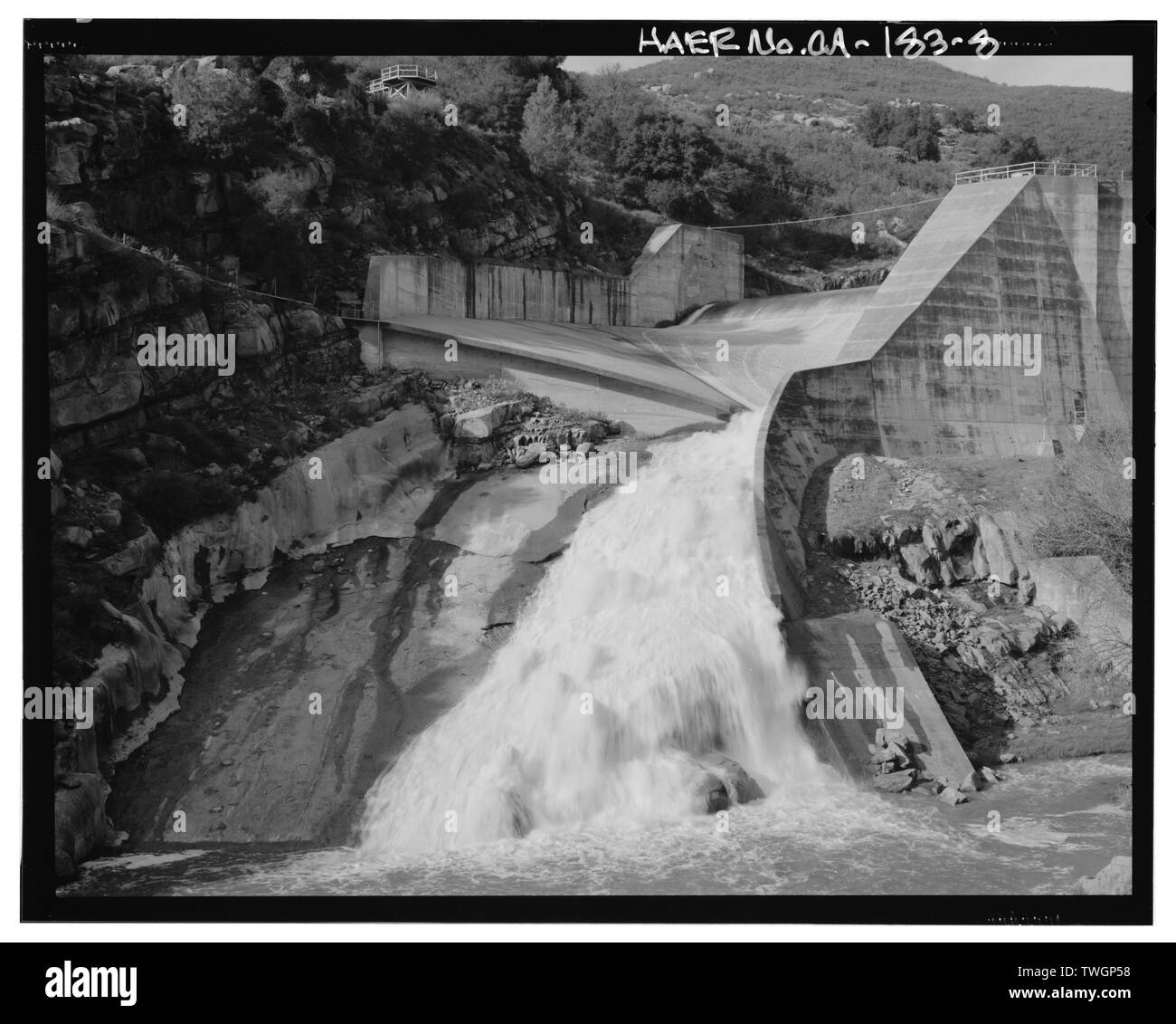 ROCK FACE TREATED WITH GUNITE TO PREVENT EROSION. CAMERA FACING ...