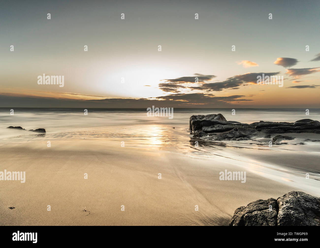 Sunset at Saligo Bay Stock Photo - Alamy