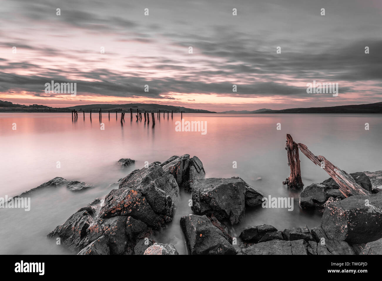 Sun setting over Salen Old Pier and the Sound of Mull, Isle of Mull ...