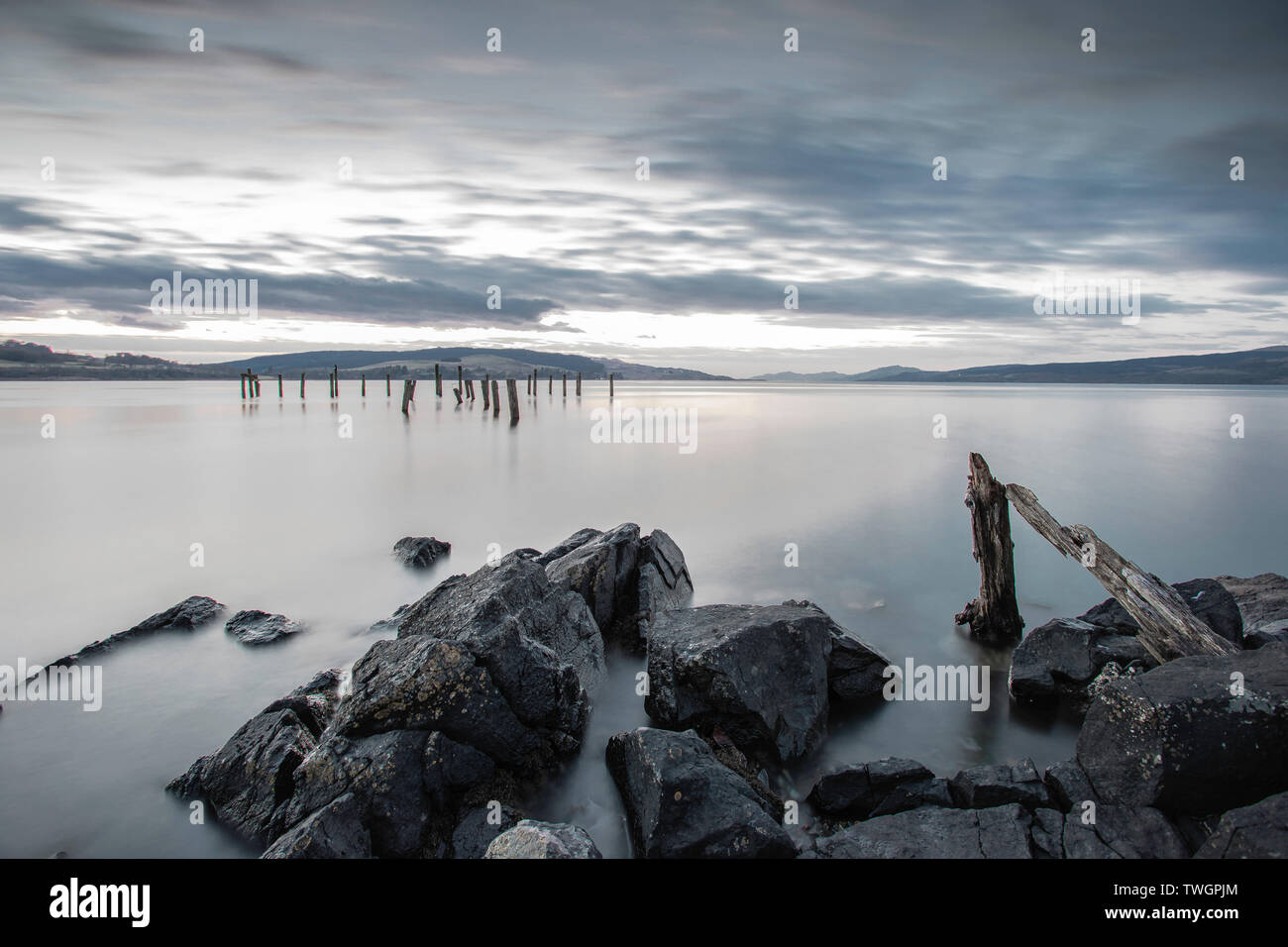 Sun setting over Salen Old Pier and the Sound of Mull, Isle of Mull ...