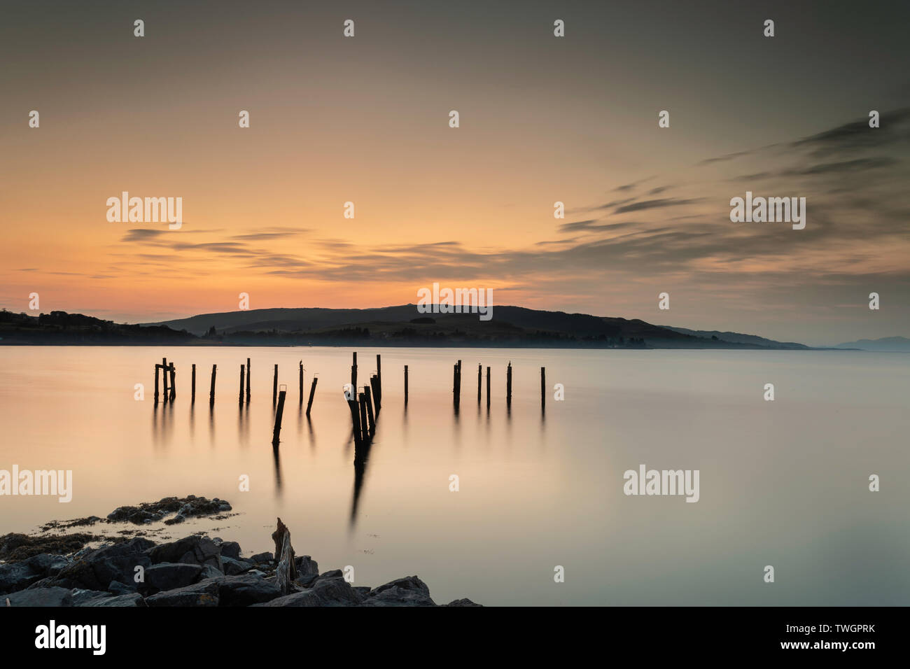 Sun setting over Salen Old Pier and the Sound of Mull, Isle of Mull ...