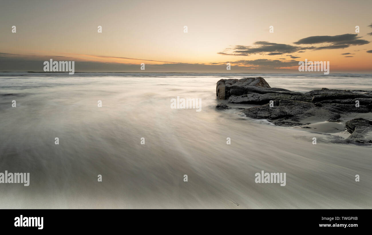 Sunset at Saligo Bay Stock Photo - Alamy