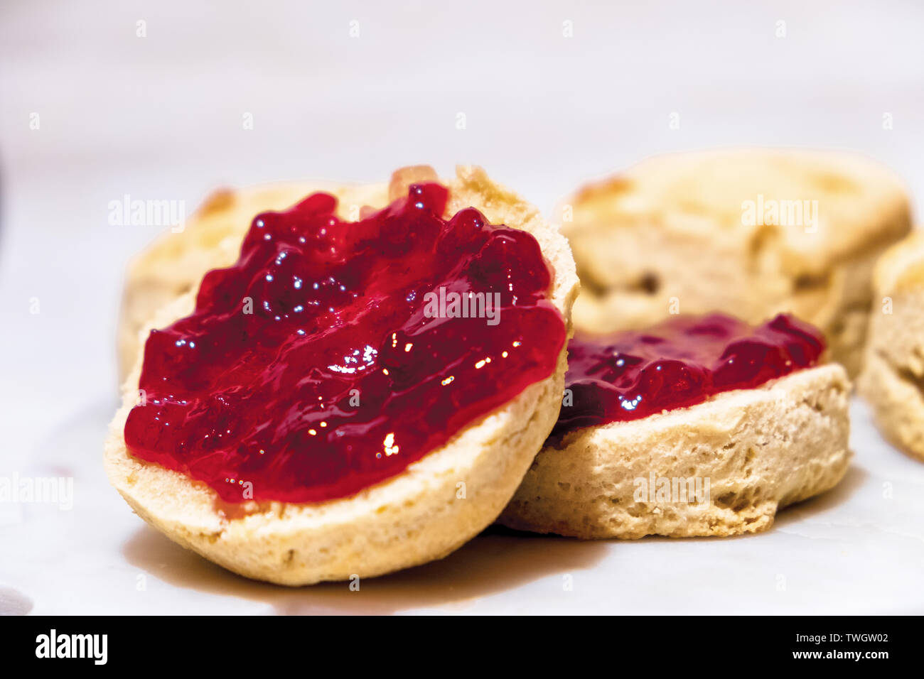 Light Golden Home Baked Scone Cut in Half and Topped with Luscious ...